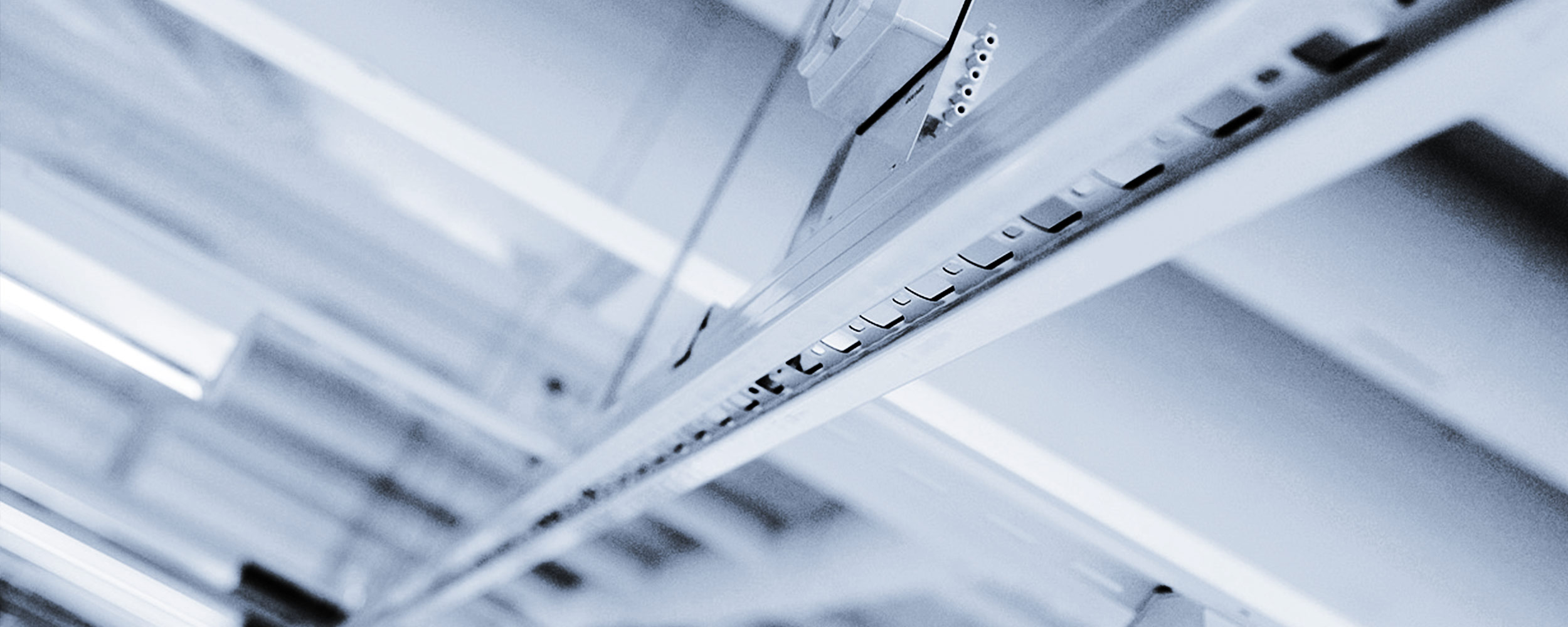 How to install a luminaire onto a lighting suspension rail using a ...